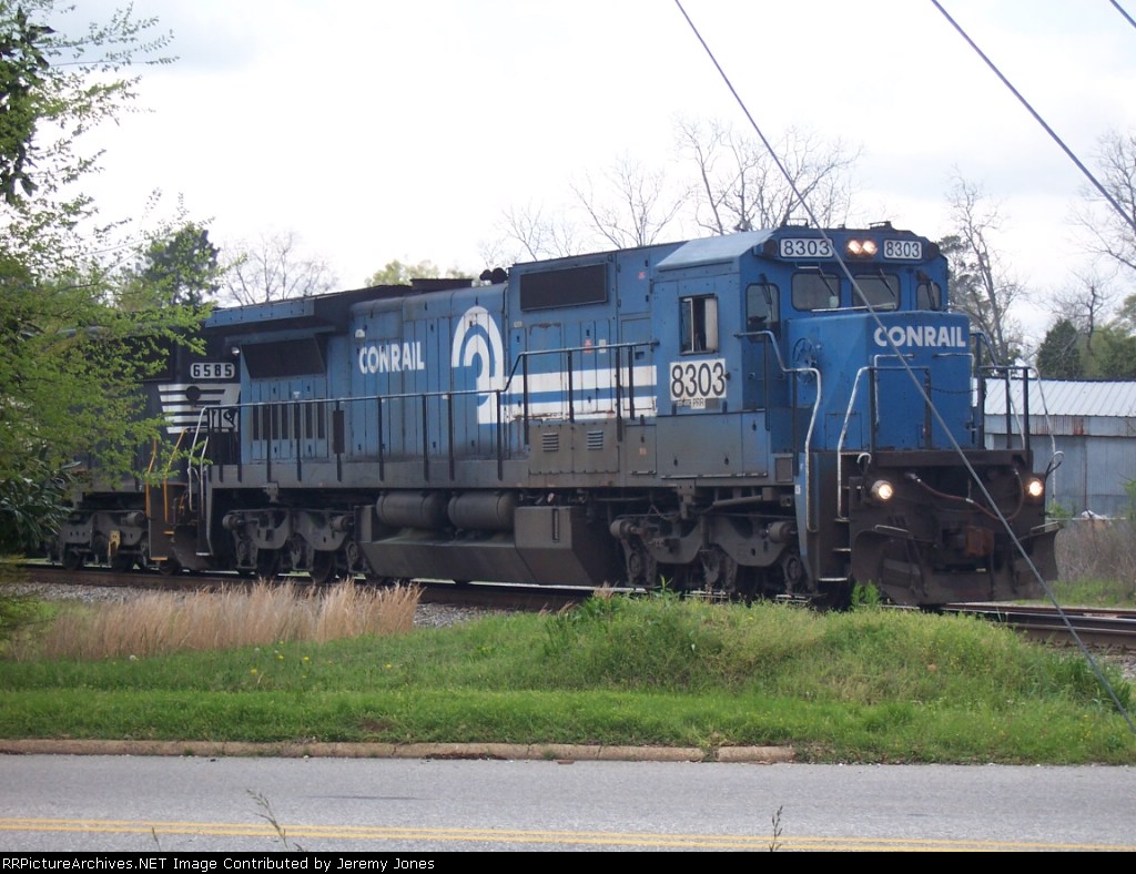 NS 8303 leads a westbound into Opelika.